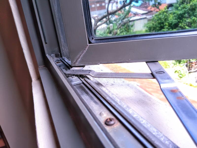 Window Hinge that Serves To Support the Window Stock Photo - Image of ...