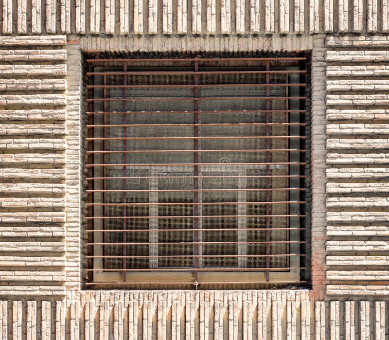 Window with Horizontal Bars on a Brick Wall Stock Image - Image of ...