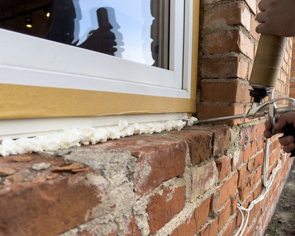 Window Installation. the Process of Insulating Windows with ...