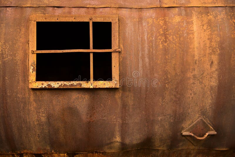 Window in an iron wall stock photo. Image of rusted - 101720798