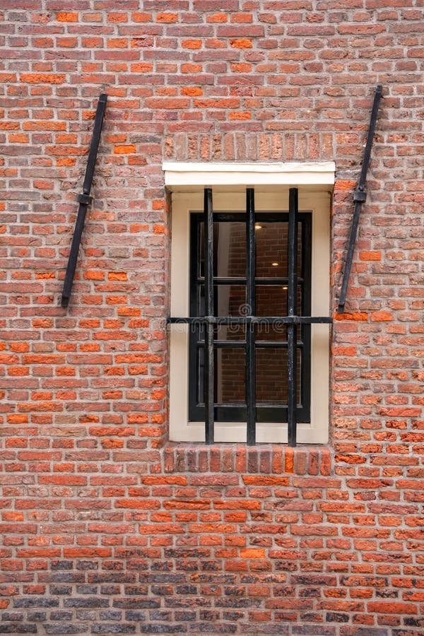Window with Lattice. Orange Brick Wall Stock Photo - Image of orange ...