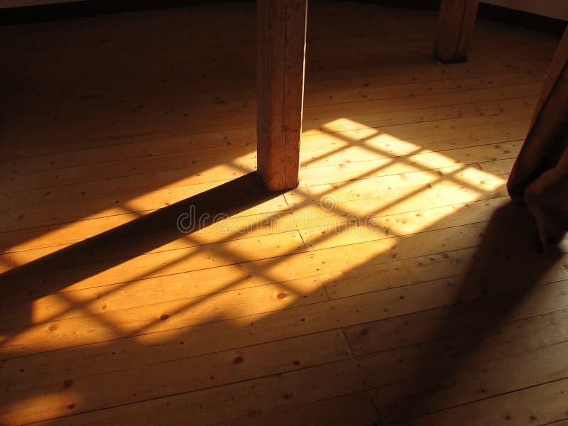 Sunlight Through Window On Floor
