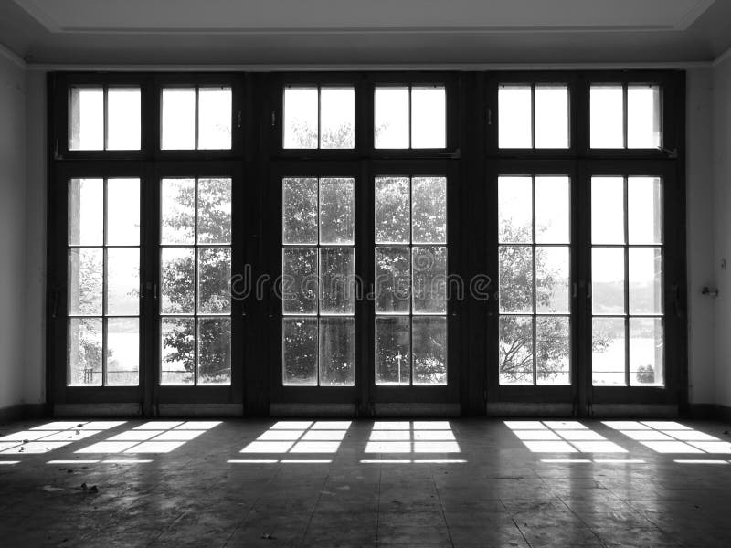 Window with Light Reflection on Floor and Tree in Backlight Stock Photo ...