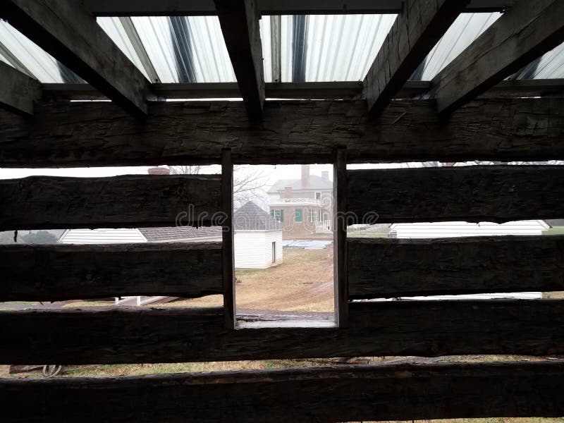 Window in Log Cabin Looking Outside To Buildings Stock Image - Image of ...