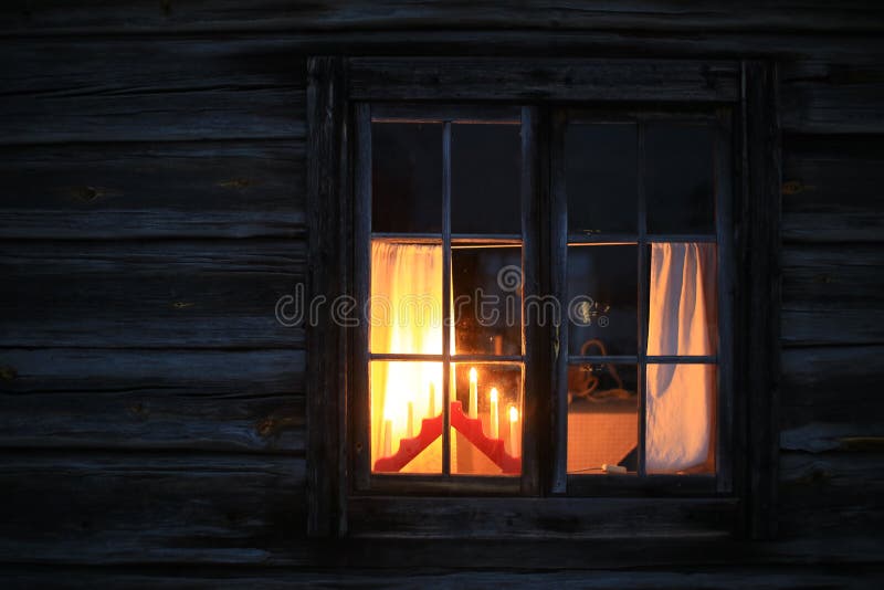 Window of Log Hut with a Candle Holder As Christmas Decoration Stock ...