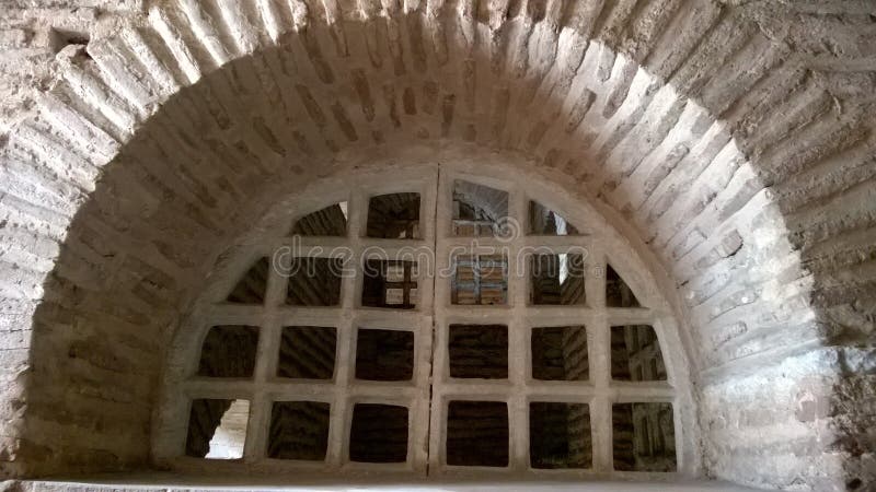 A window made of stone stock photo. Image of cell, square - 156211370