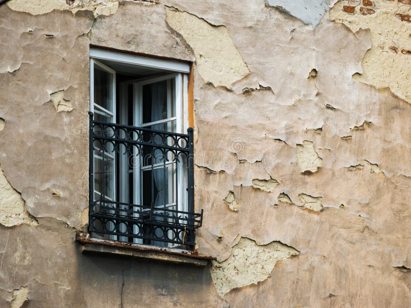 Window with a Metal Grill on an Old Wall with Peeling Plaster Stock ...