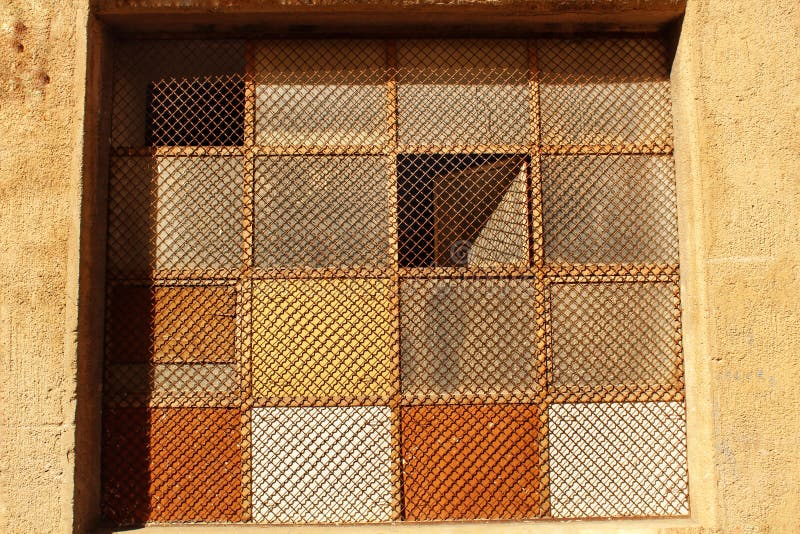 Window with Metalized Abstract and Symmetrical Grid Stock Photo - Image ...