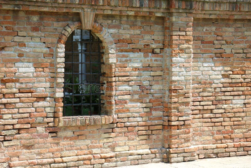 Medieval Window with Metallic Grating in the Middle of the Brick Stock ...