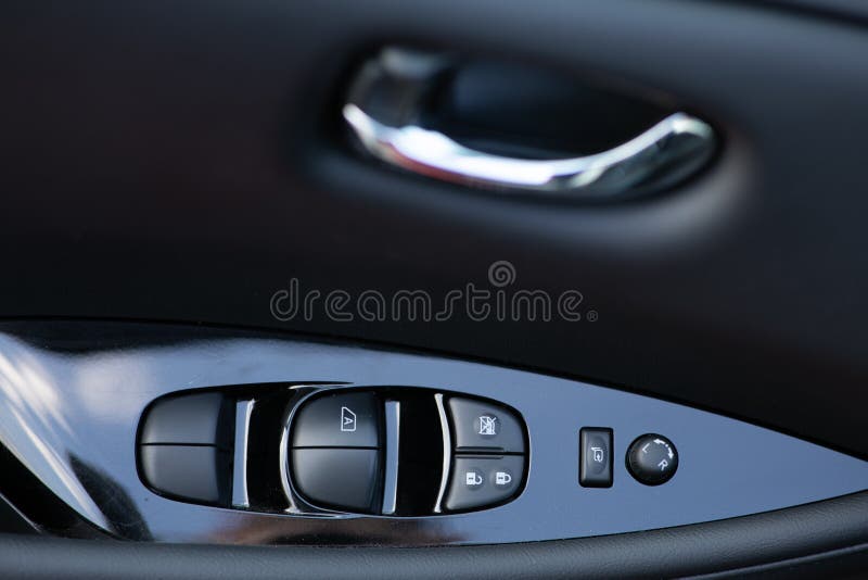Detail on Buttons Controlling the Windows in a Car. Car Interior ...