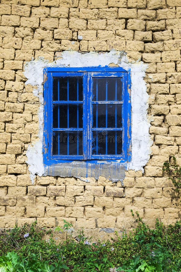 Window in mud wall stock image. Image of green, window - 50701041