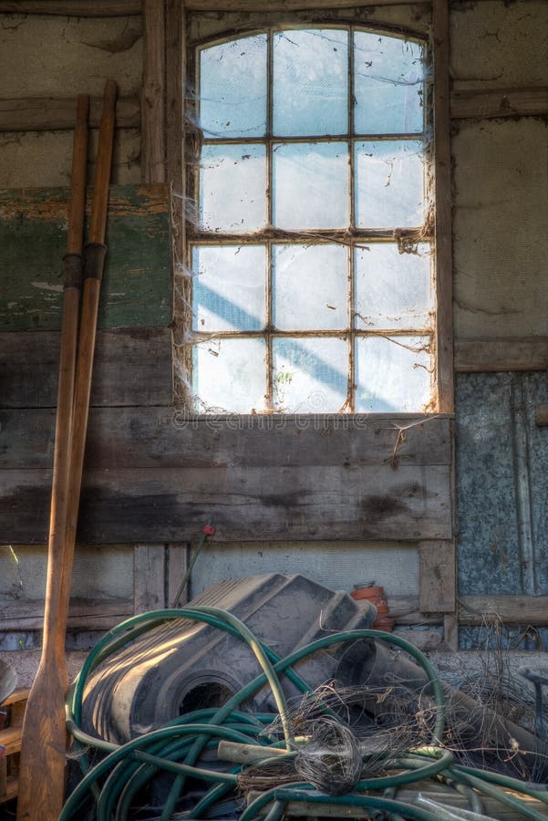 Window, oars and a mess stock photo. Image of industrial - 39660580