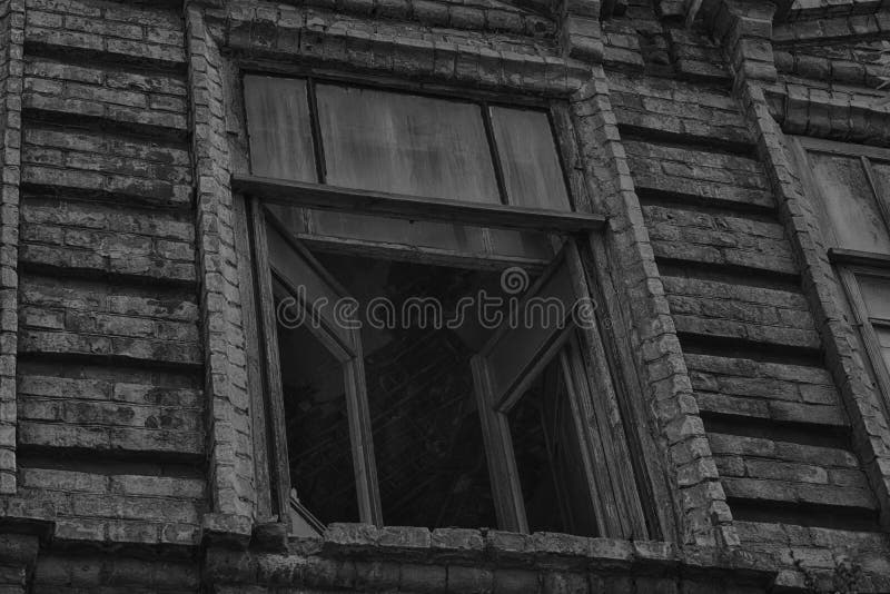 The Window of the Old Creepy Abandoned Scary House in Which Lives a ...