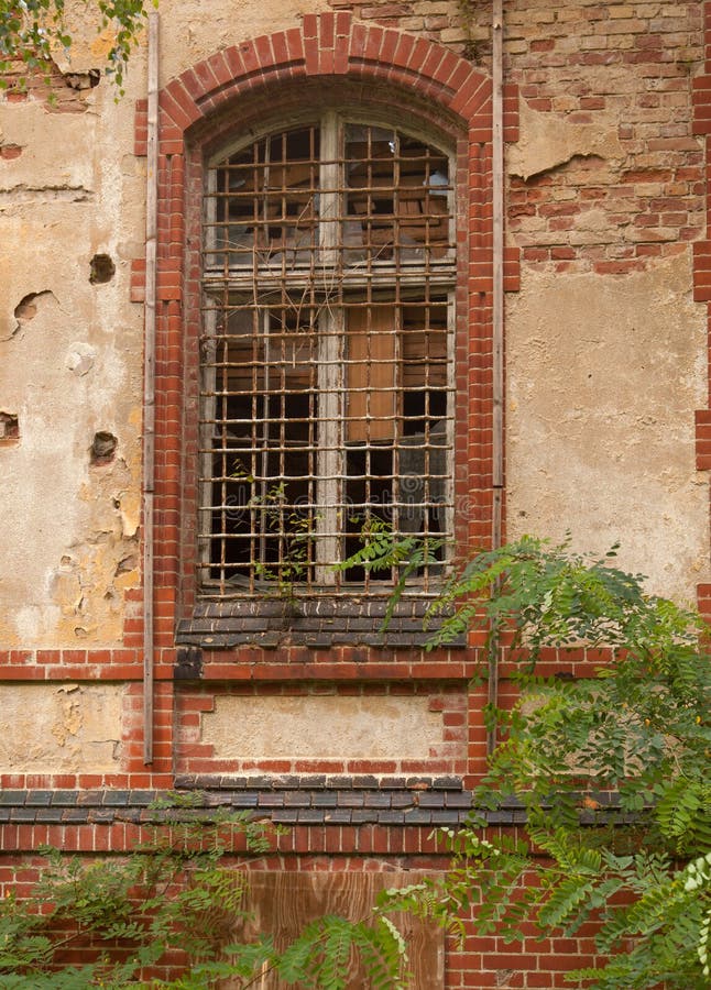 A window in an old wall stock photo. Image of estate - 26366660