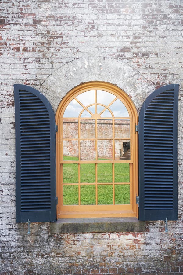 Window with Open Shutters in a Wall Made of Old Brick Stock Photo ...
