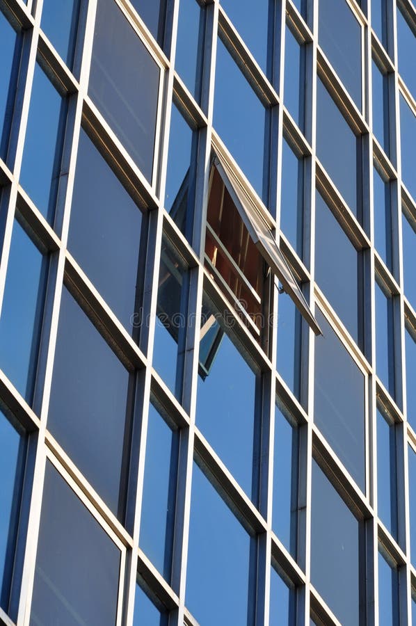 Window Opened on Glass Facade of Modern Building Stock Image - Image of ...