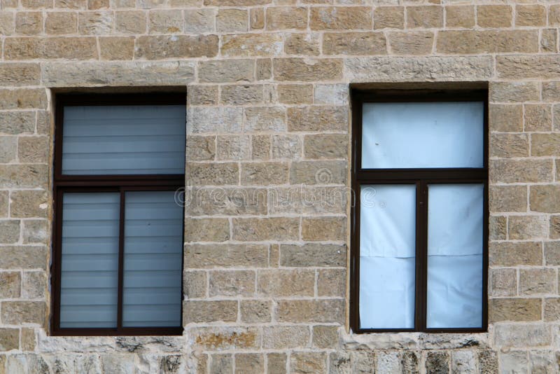 Small window in a big city stock photo. Image of stone - 133826092