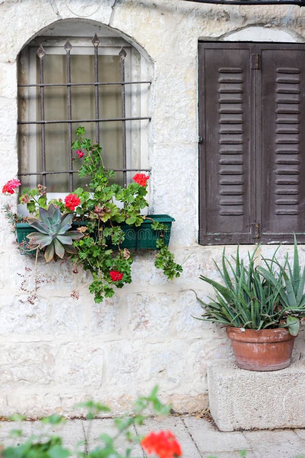 Window with Openwork Wrought Iron Lattice and Iron Shutters Stock Photo ...