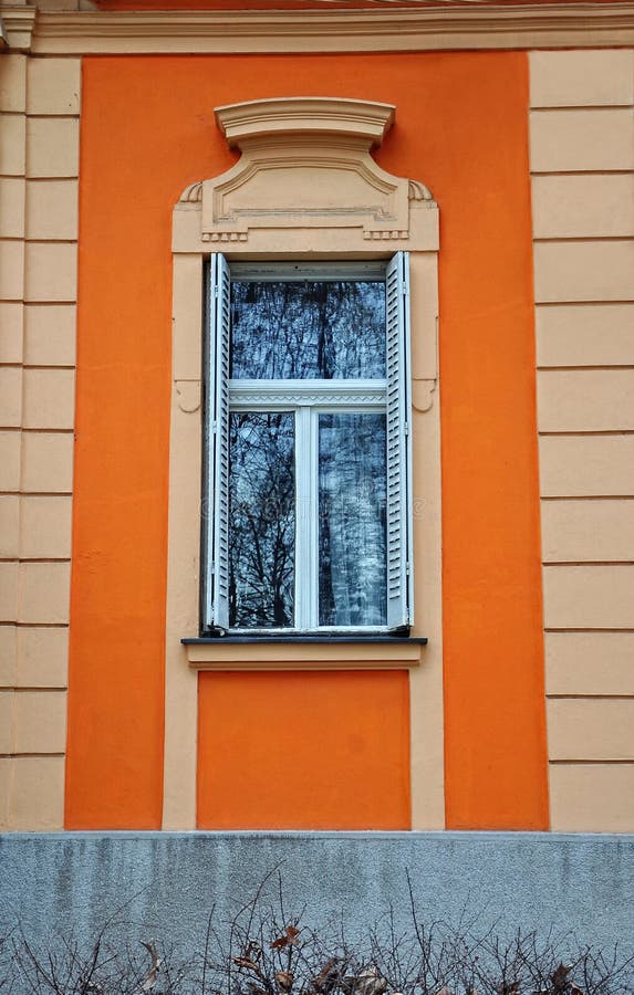 Window at the orange house stock photo. Image of construction - 38381674