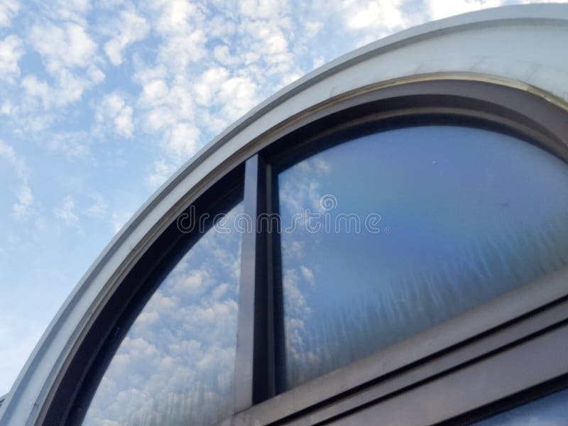 Window Outside the House with a Cloudy Blue Sky Background Stock Image ...