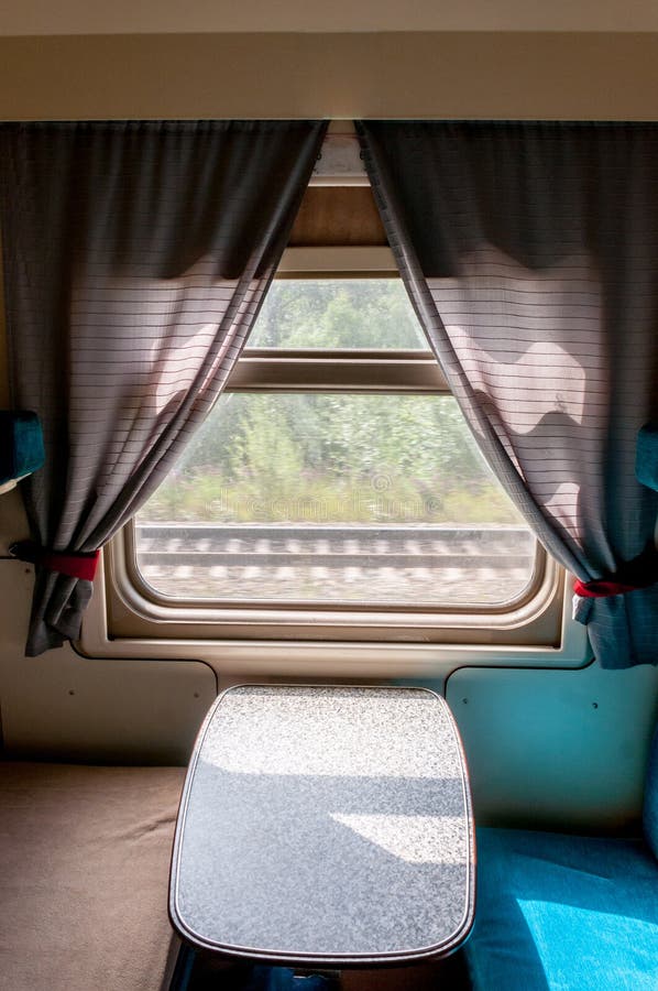 A Window and Part of the Interior of a Compartment Car Inside a ...