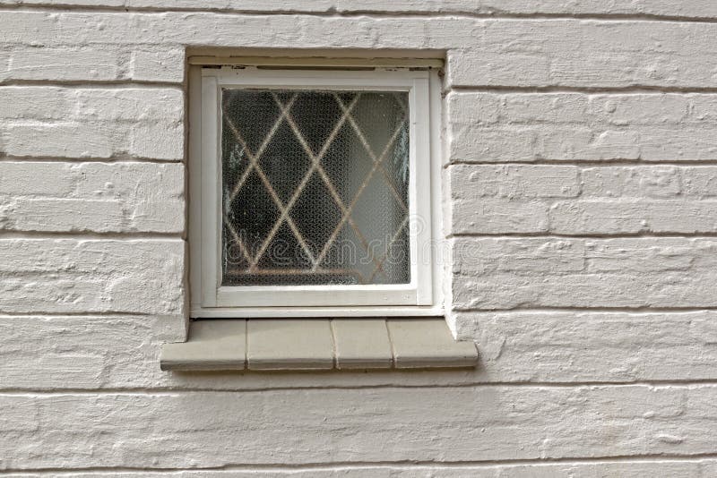 Window Patterns and Texture of Cement Covered Brick Wall Stock Image ...