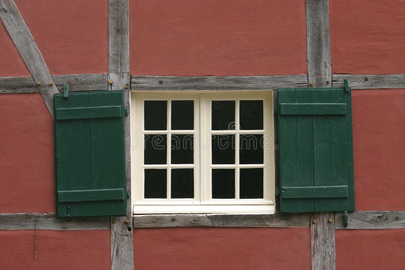 Shutters on Dutch Windows with Traditional Red and White Design Stock ...