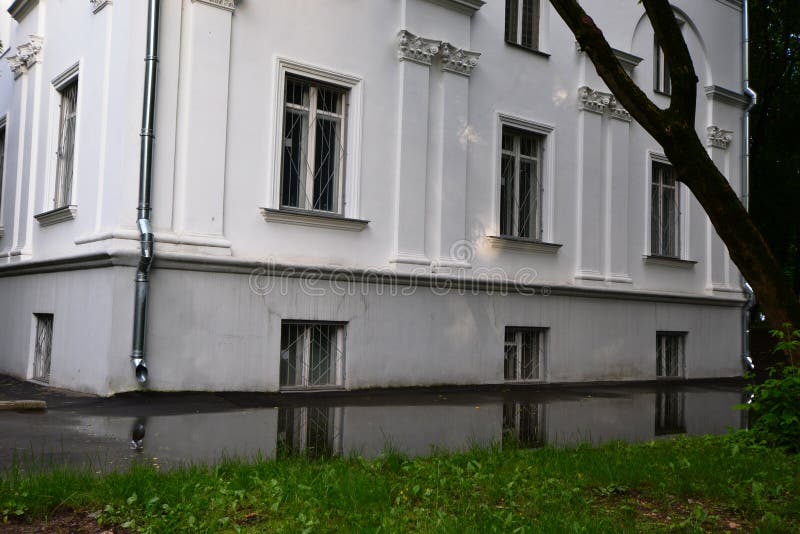 Window Reflected in a Puddle Stock Photo - Image of windows, building ...