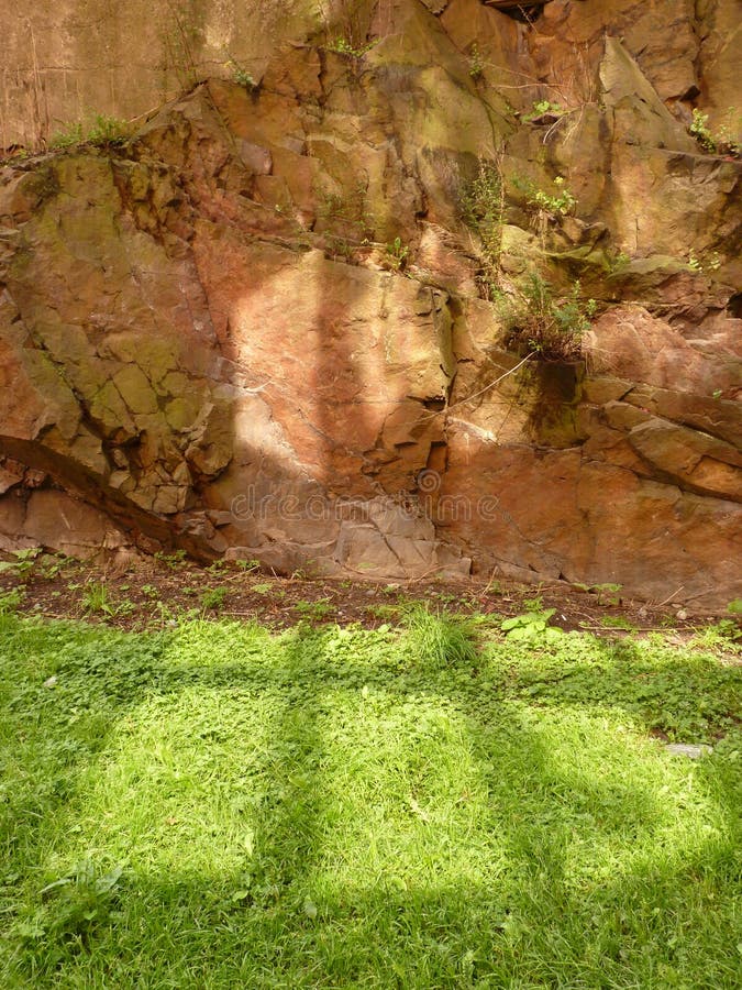 Window Reflections and Rock Face Stock Photo - Image of shade, surface ...