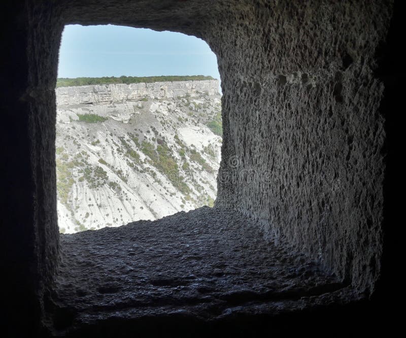 Window in the rock cave stock image. Image of wall, blue - 231896485