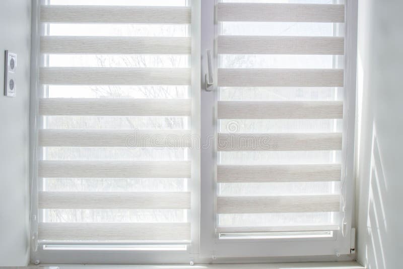 Window Roller Duo System Day and Night. Close Up on Roll Curtains ...