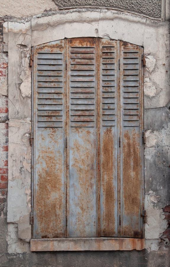 Window with Rusty Shutters in an Old House Stock Photo - Image of ...