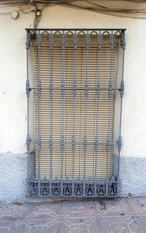 Window with Security Shutters and Decorative Steel Bars. Stock Photo ...