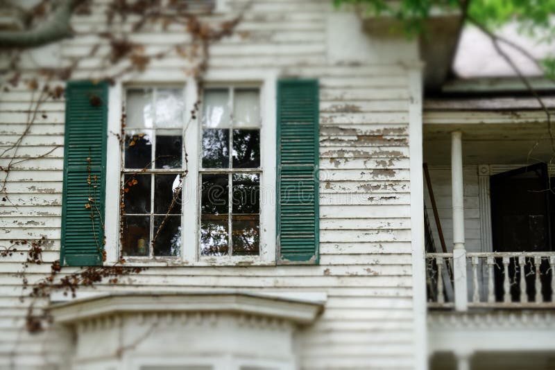 Window and Shutters in Run Down Older Home with Peeling Paint. Stock ...