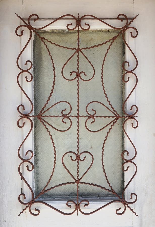 Window with Styled Iron Grid Stock Photo - Image of pattern, decorative ...