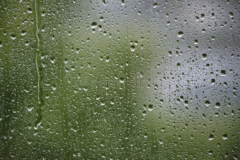 Window Surface Covered with Many Water Droplets of Various Sizes ...