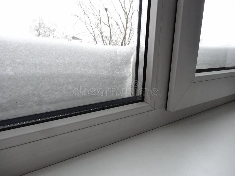 Window with a Thick Layer of Snow on the Outside Stock Image - Image of ...