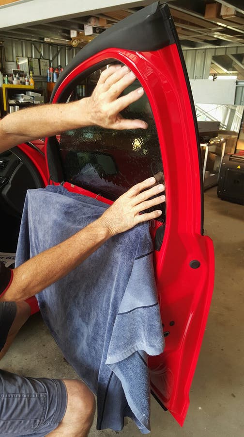 Car Window Tinting. Process of Installation Window Tint in Car ...