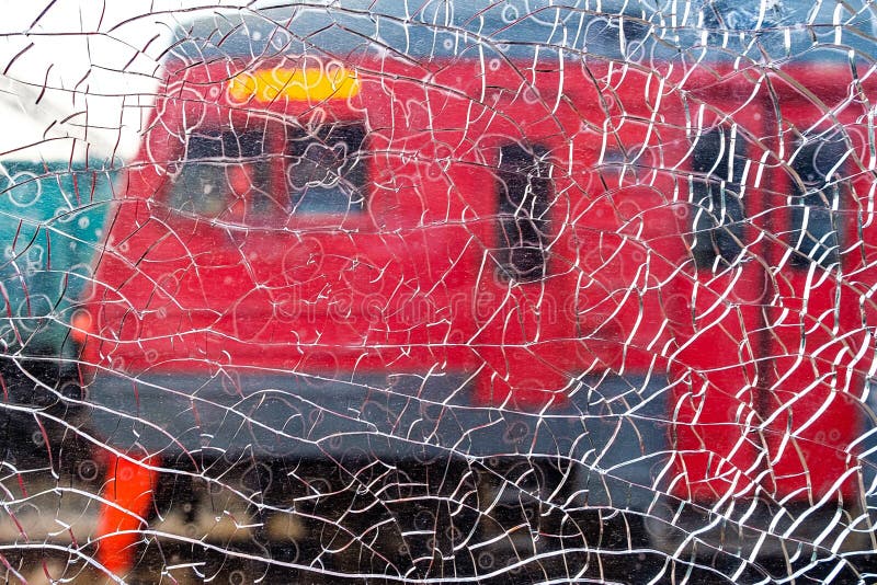 The Window in the Train is Broken and Covered with Small Cracks in the ...