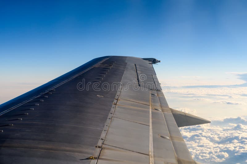 Window View of Airplane Wing Above Clouds Stock Photo - Image of aerial ...