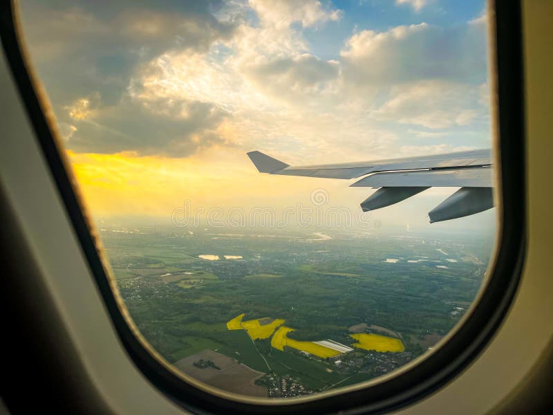 Window View from Inside the Aircraft while Flying Above Beautiful ...