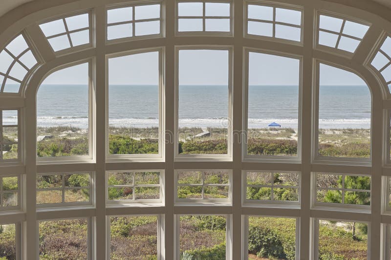 Window view of ocean beach stock photo. Image of windowpane - 121135726