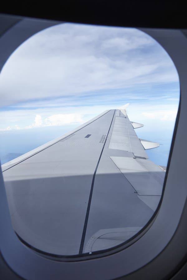 Window View of Plane on Wingside through Storm Stock Photo - Image of ...