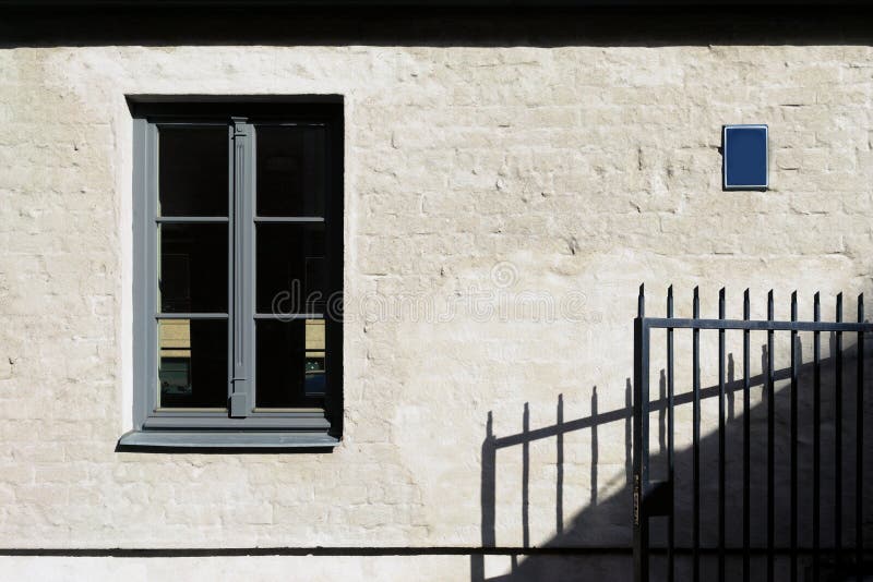 Window on the Wall with a Gate Stock Photo - Image of decorative ...