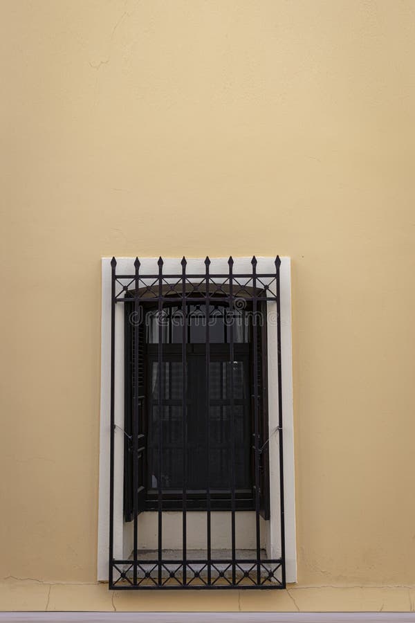Window with Metal Outer Railing on Smooth Beige Clean Wall Stock Image ...