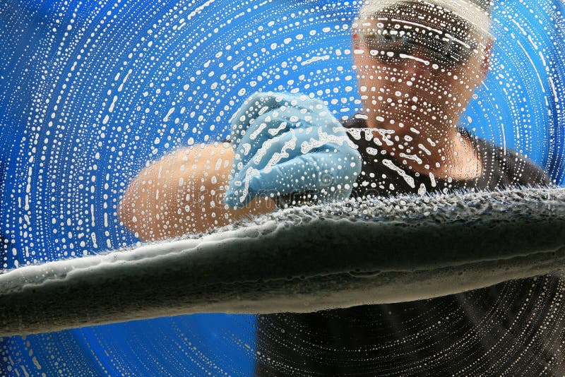 Window Washer Washing a Window Stock Photo - Image of movement, adult ...