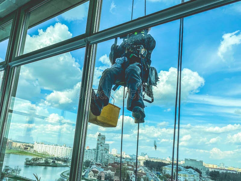 Window Washer Working at Building Editorial Photo - Image of danger ...
