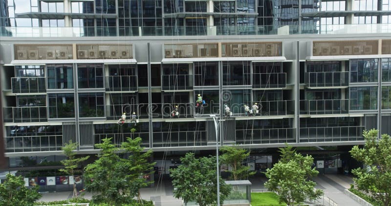 Window Washers Using Industrial Climbing Techniques Clean the Facade of ...