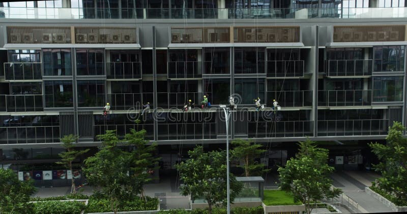 Window Washers Using Industrial Climbing Techniques Clean the Facade of ...