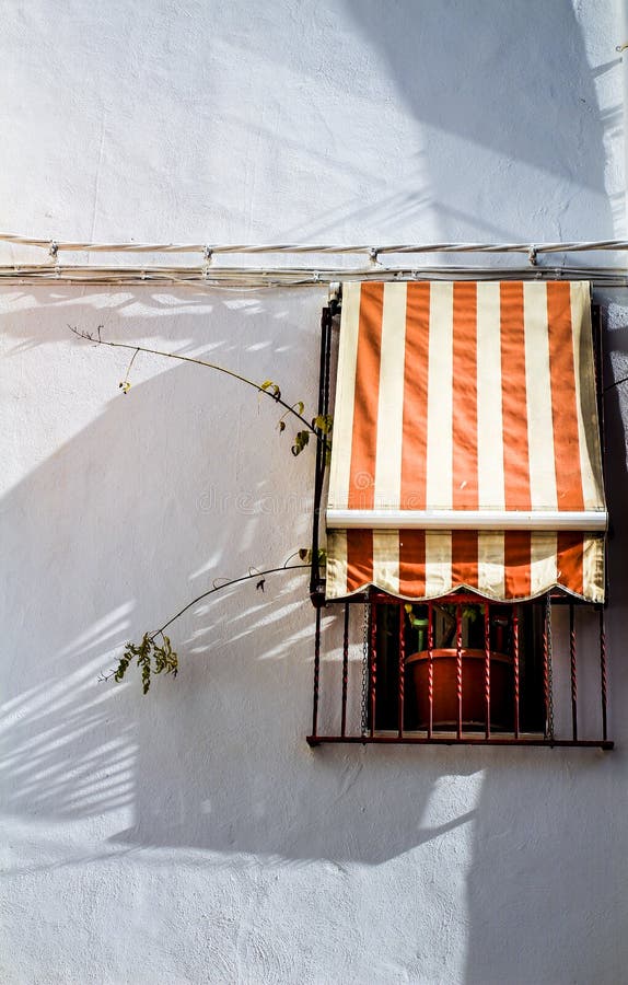 Window with White and Orange Striped Awning Stock Photo - Image of ...